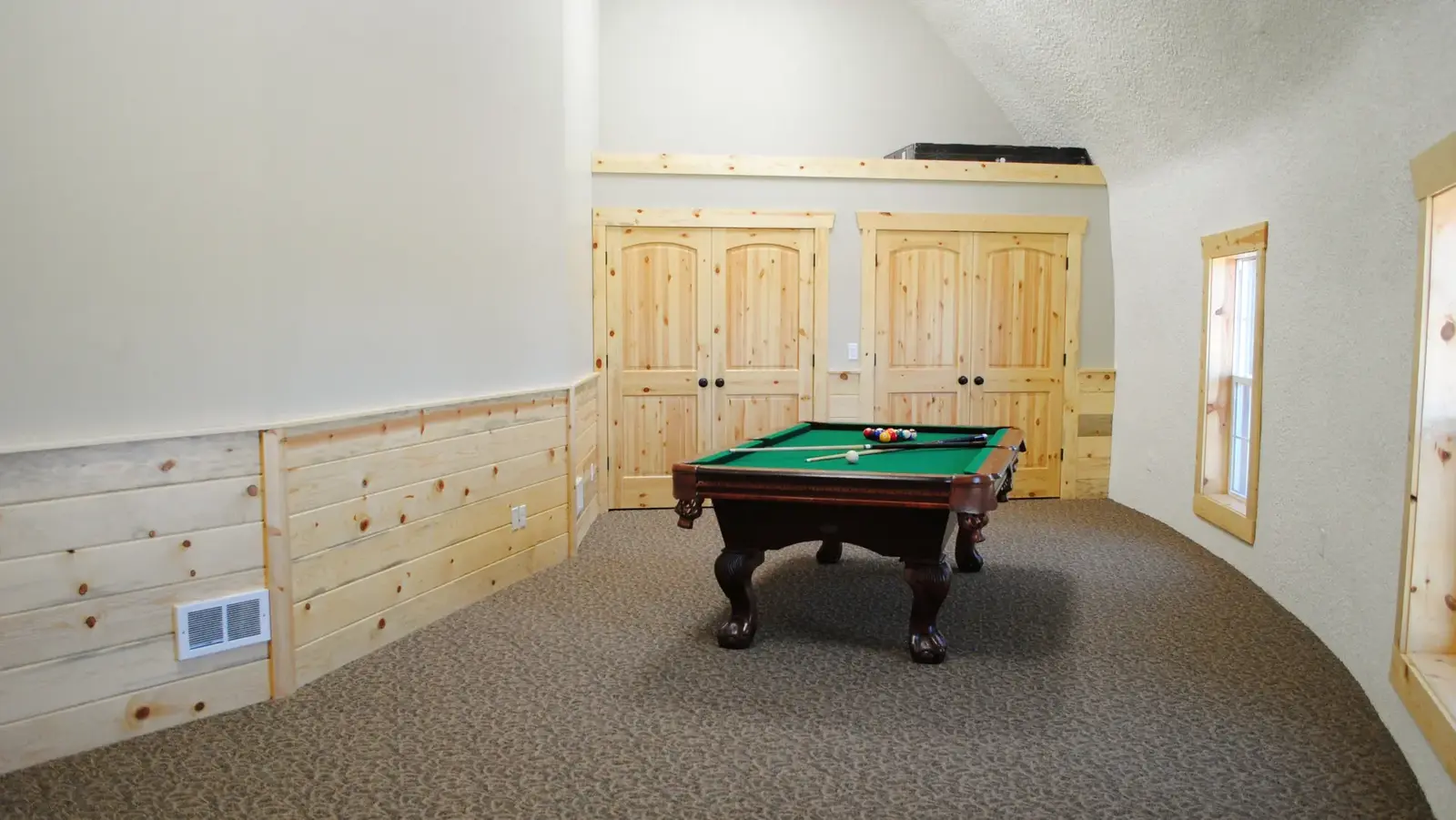 Image: Upstairs game room. - Monolithic Dome Institute