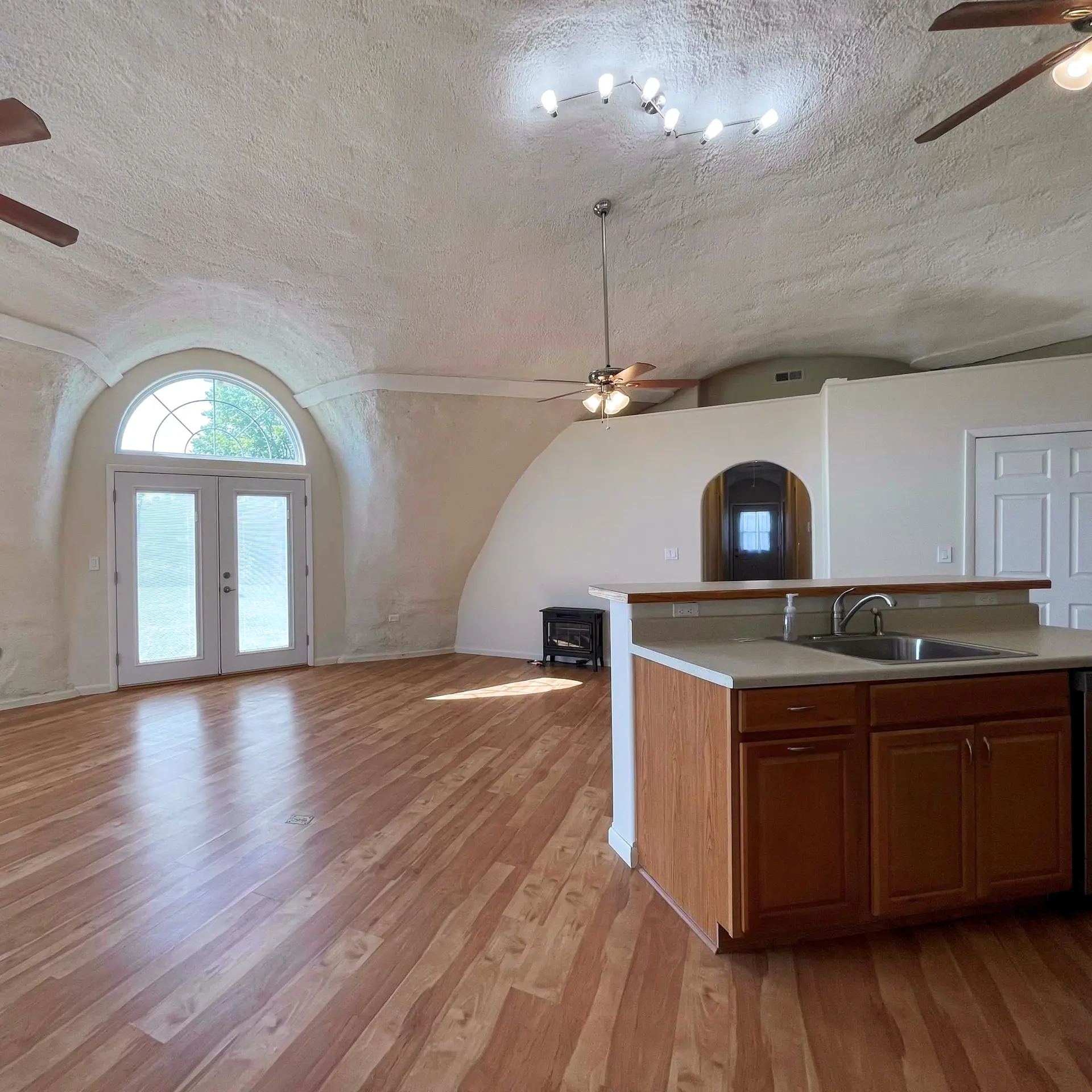 Image: The great room features vinyl plank flooring. - Monolithic Dome ...